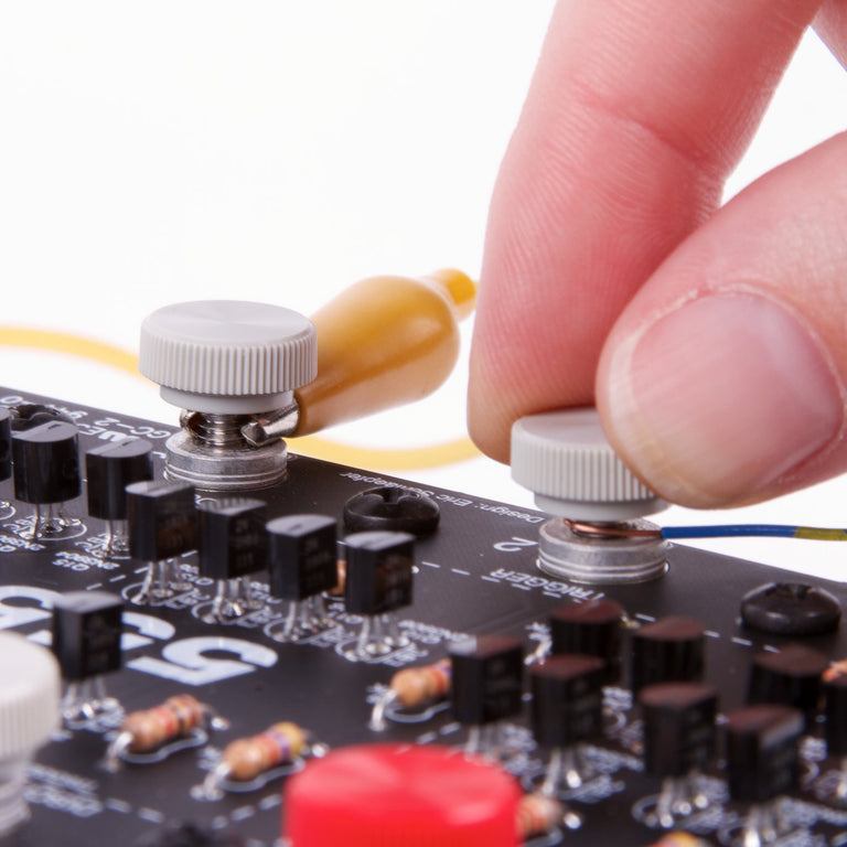 The Three Fives Kit: A Discrete 555 Timer